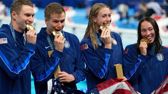 Why do Olympic athletes bite their medals? - Graphic Online